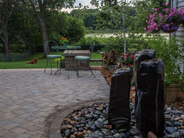 Patio with Water Fountain and Seating | HGTV