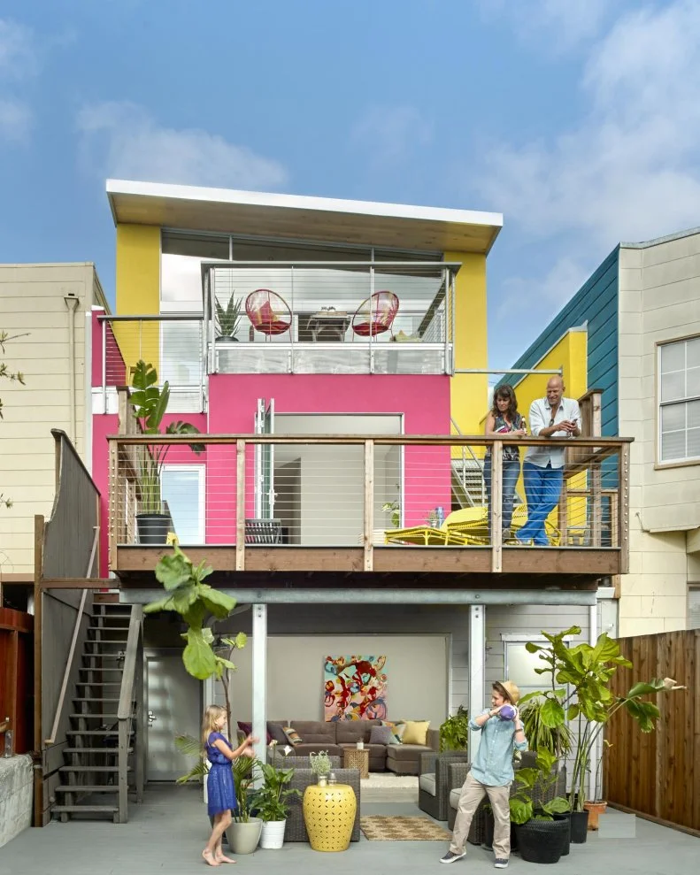 Modern Home Features Gray and Yellow Exterior | HGTV