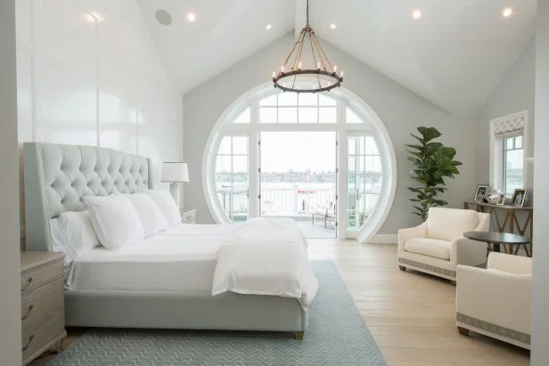 Master Suite Features Distinctive Round Window Architecture | HGTV