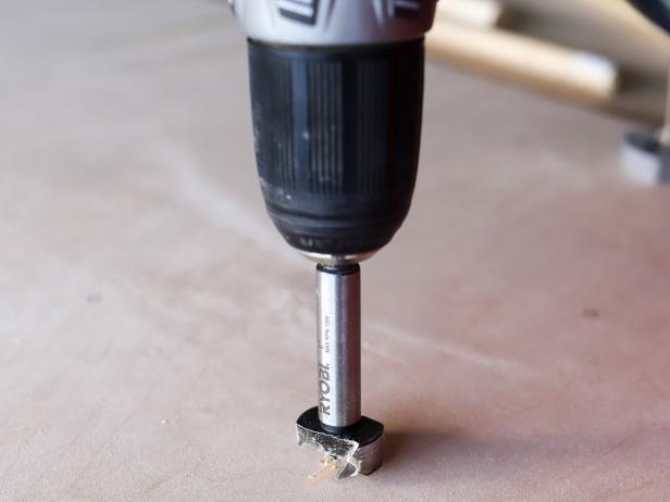 Free Up Cabinet Space With a DIY Wall-Mounted Pot Rack | Room Makeovers ...