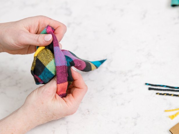 3 Ways to Upcycle Buffalo Plaid Scarves Into DIY Holiday Decor | HGTV