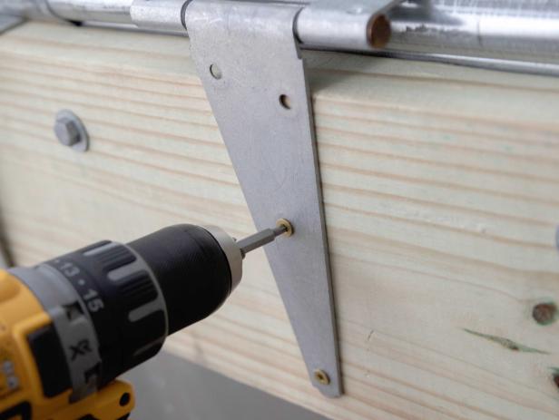 DIY Stock Tank Garden Tool Storage Container | HGTV