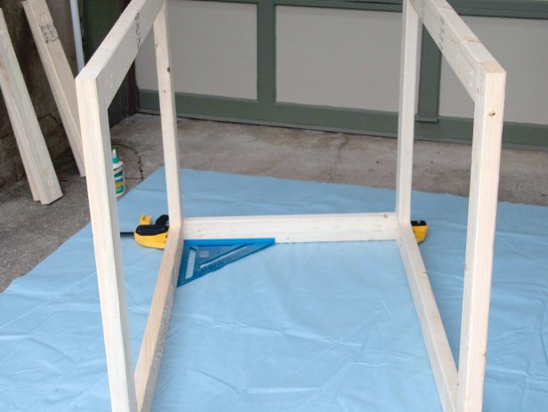 DIY Two-Tiered Garage Storage Stand With Ramp | HGTV