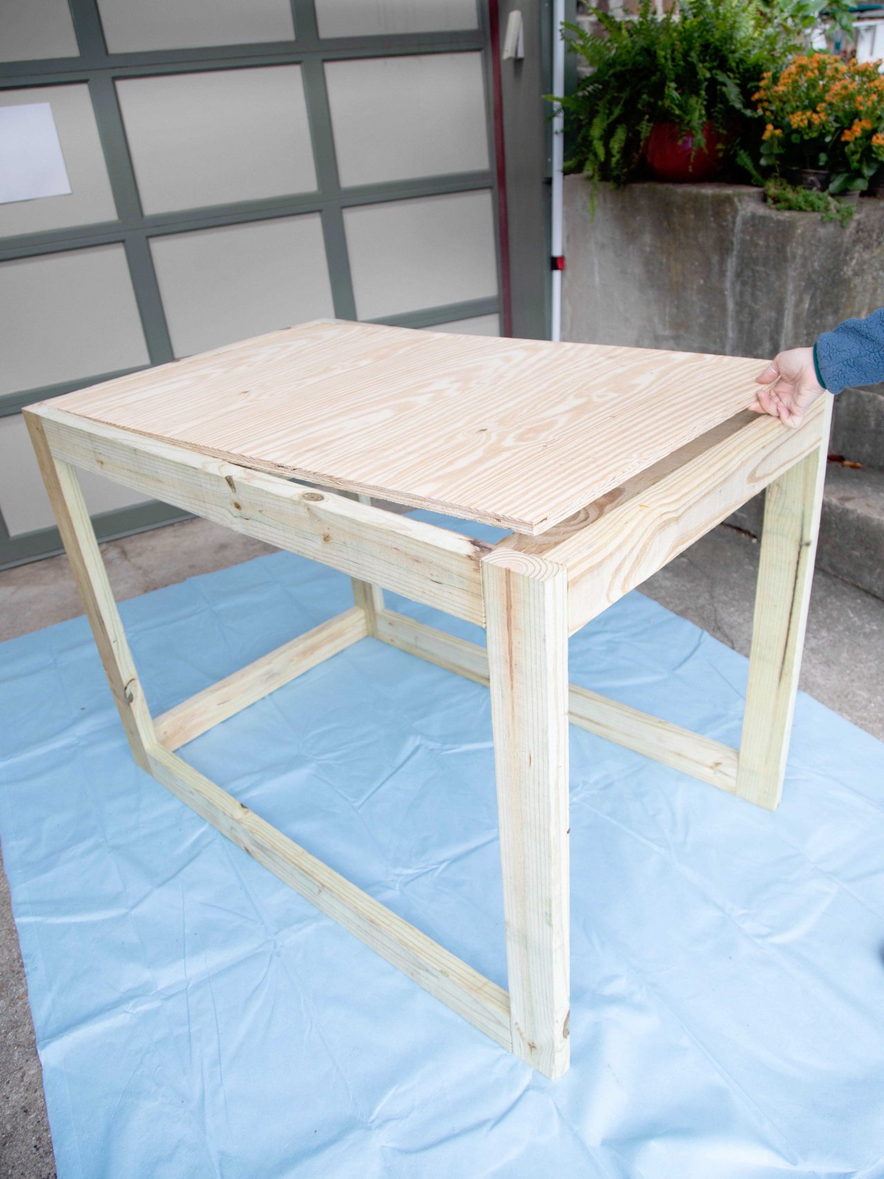 DIY Two-Tiered Garage Storage Stand With Ramp | HGTV