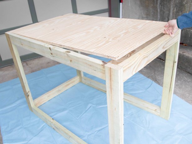 DIY Two-Tiered Garage Storage Stand With Ramp | HGTV