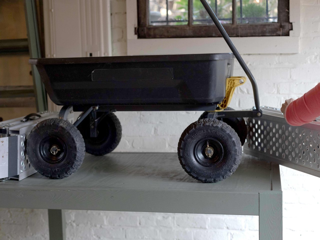 DIY Two-Tiered Garage Storage Stand With Ramp | HGTV