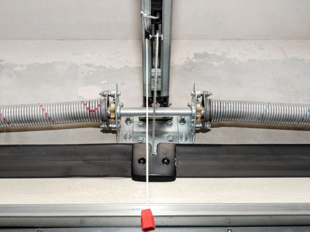 How to Install a Replacement Garage Door Spring | HGTV