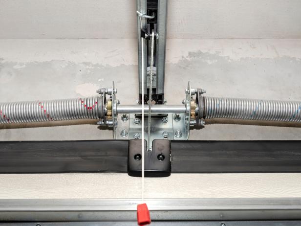 How to Install a Replacement Garage Door Spring | HGTV