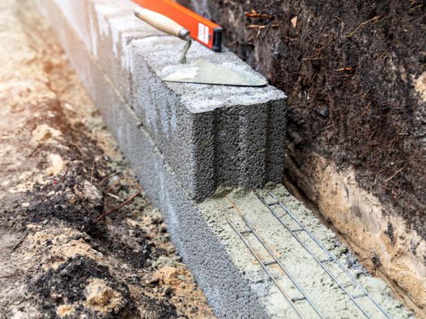 Planning and Building a Concrete Block Retaining Wall | HGTV