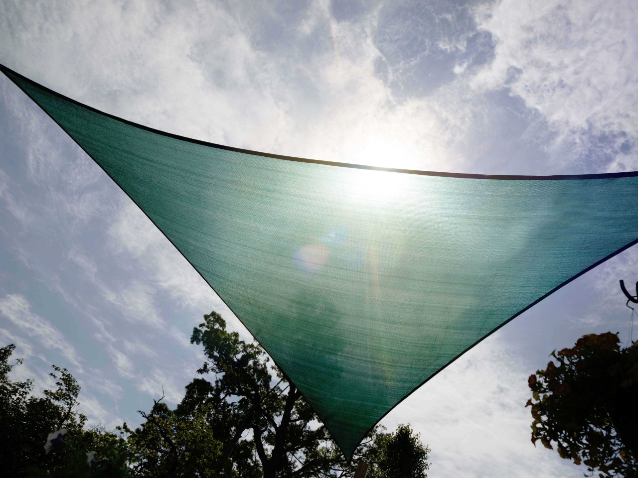 How to Install a Traingle Sun Shade Sail | HGTV