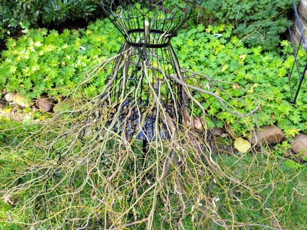 DIY Outdoor Halloween Decoration: How to Make a Stick Witch | HGTV